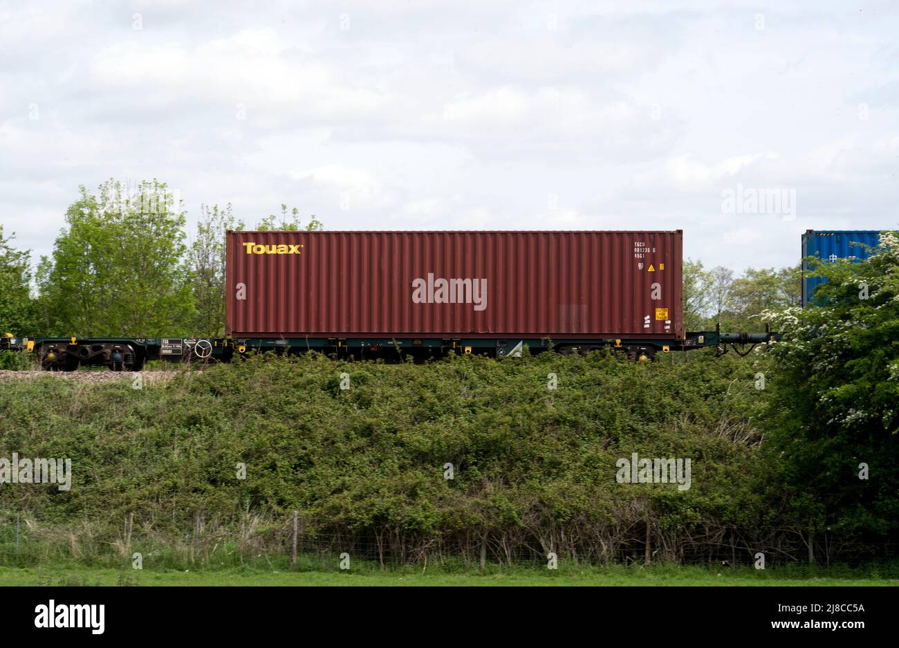 A Touax shipping container on a freightliner train, Warwickshire, UK ...