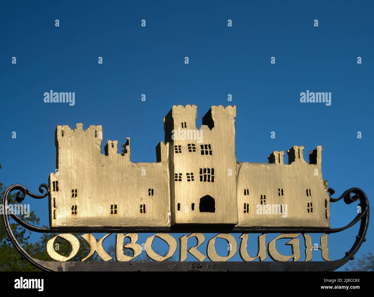 Village sign of Oxborough, Norfolk depicting Oxburgh Hall Stock Photo ...