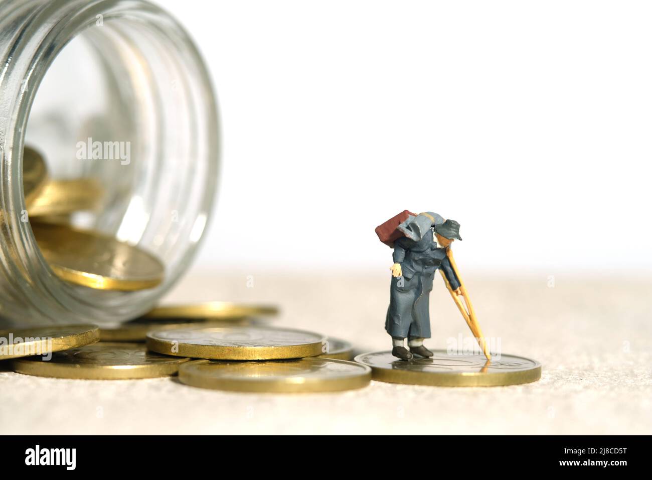 Miniature people toy figure photography. An old men grandfather walking ...