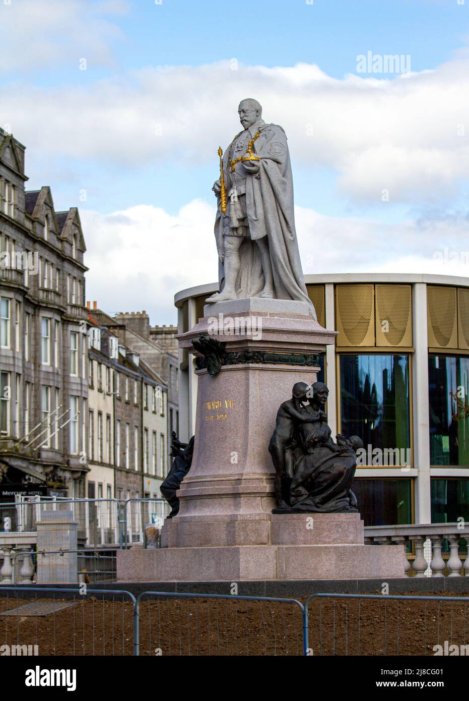 A granite statue of King Edward VII stands along Union Street beside ...