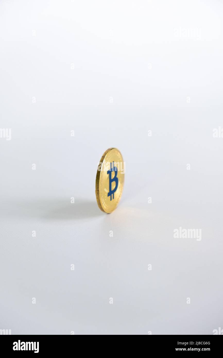 One sided face Bitcoin gold coin color with the letter "B" on Blue ...