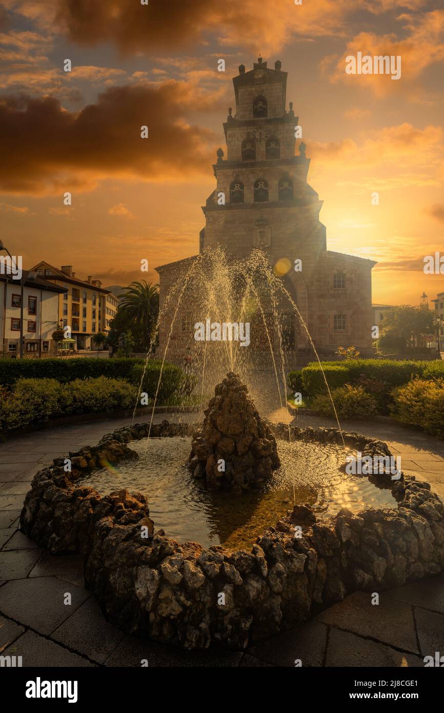 Vertical composition. Cangas de Onis square with the church in the ...