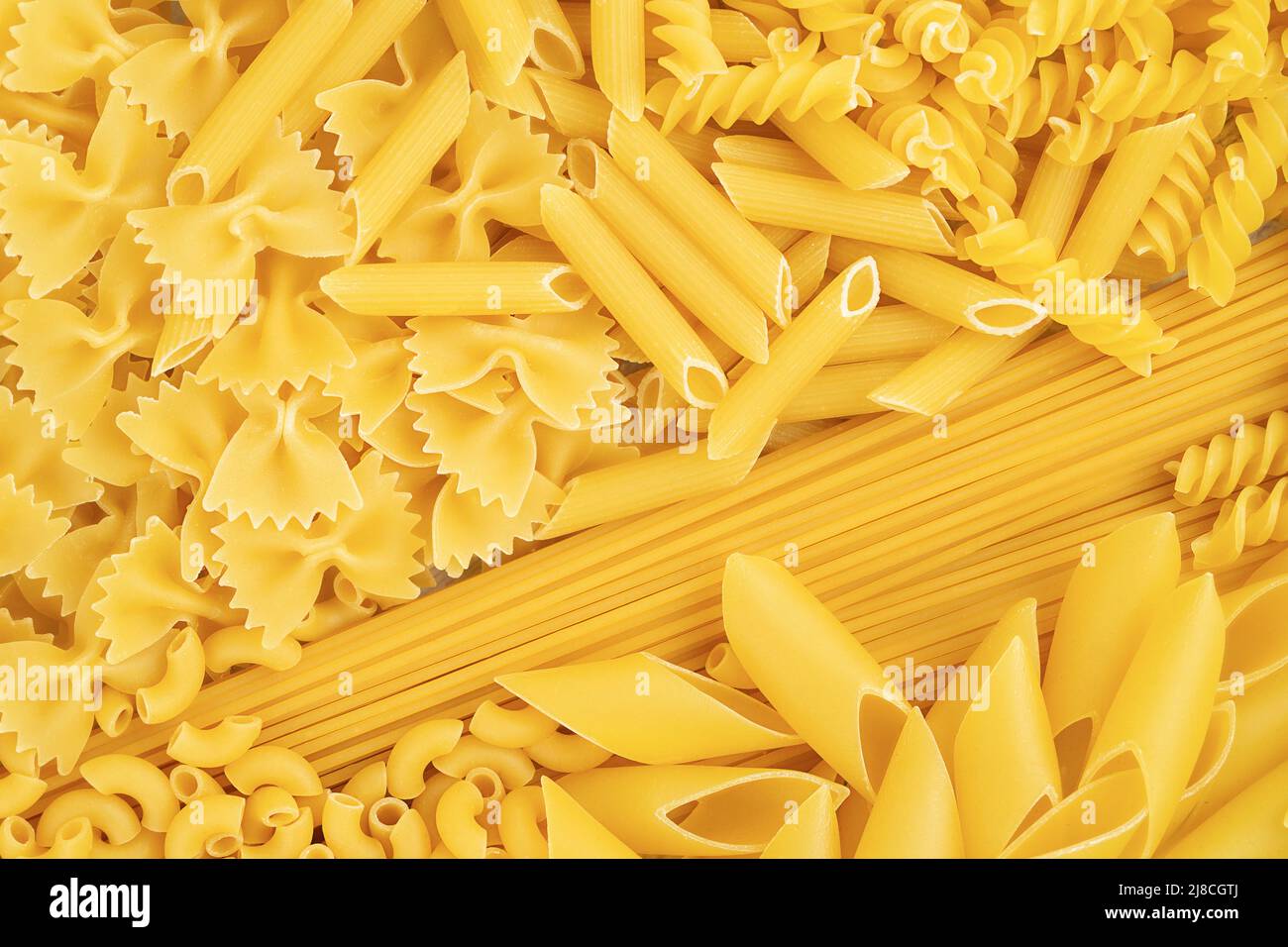 Background of different pasta types. Italian food Stock Photo - Alamy