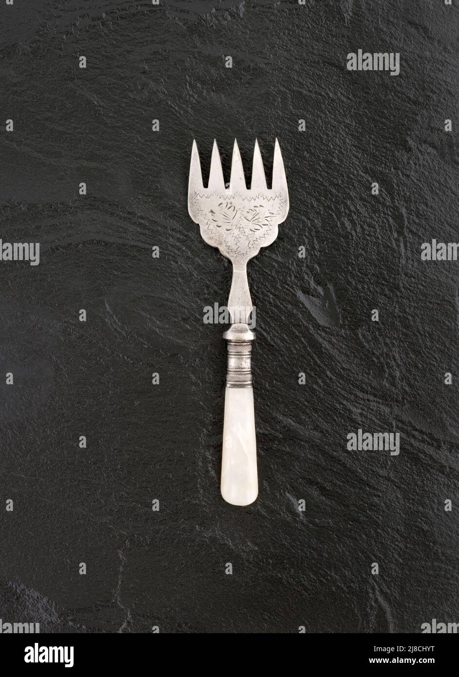 Old Antique Cake Fork Stock Photo - Alamy
