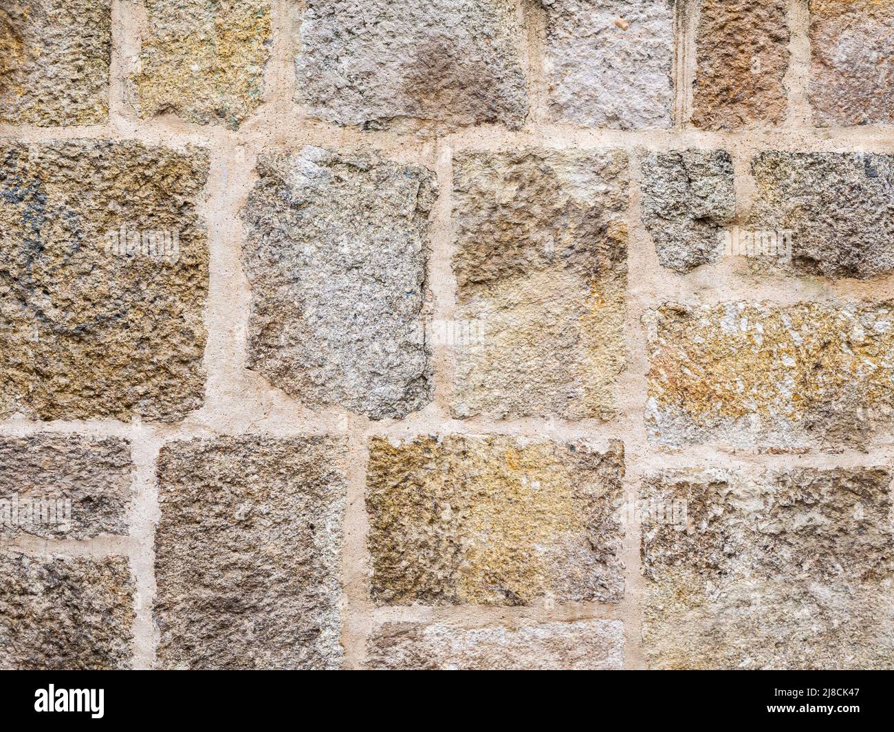 Texture of a stone block wall in an old building Stock Photo - Alamy
