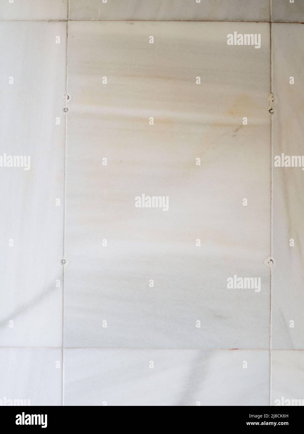 Vertical White marble on a wall. Marble tiles textures Stock Photo - Alamy
