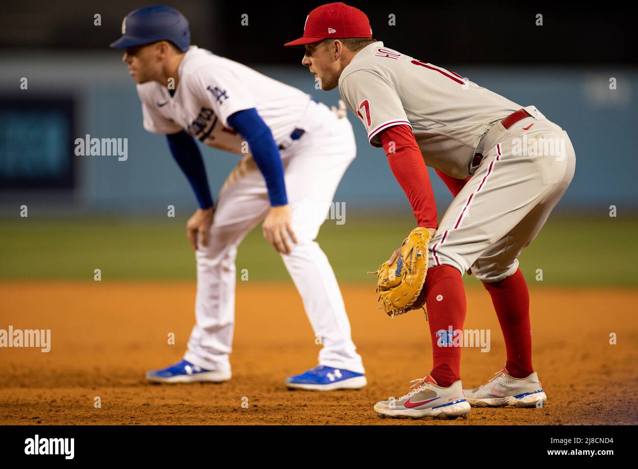 Philadelphia Phillies first baseman Rhys Hoskins (17) holds on Los ...
