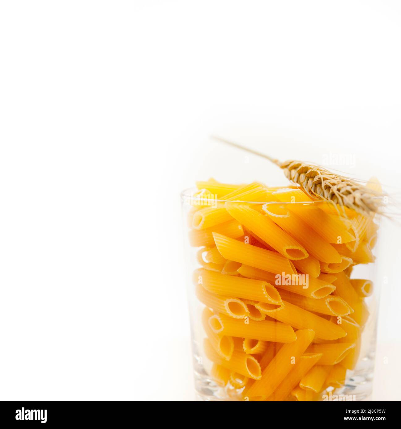 short Italian pasta penne with durum wheat grains Stock Photo - Alamy