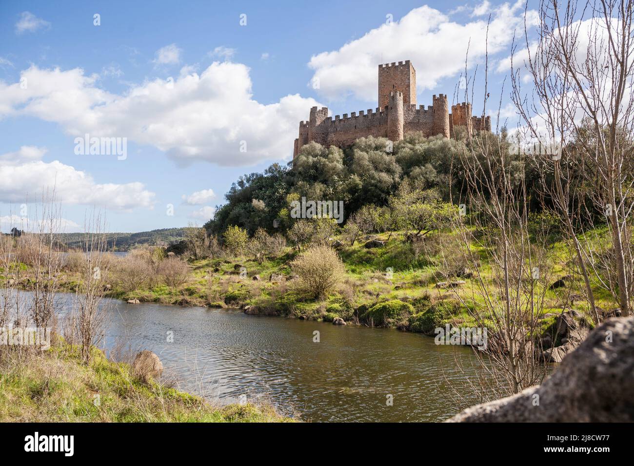 View from the banks of the Tajo River towards Almourol Castle, situated ...