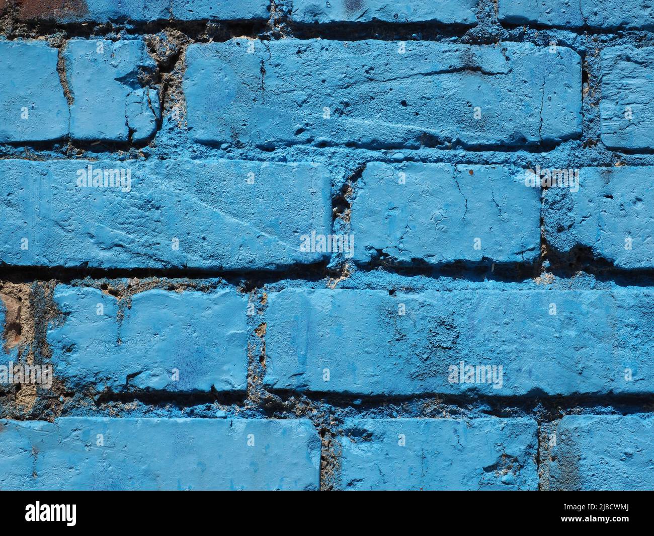 blue brick wall useful as a background Stock Photo - Alamy