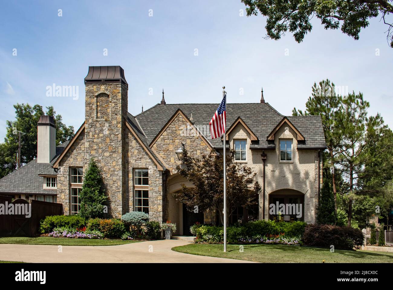 Rustic rock and brick upscale beautifully landscaped home with copper ...