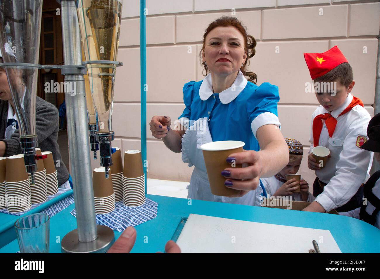 Moscow, Russia. 15th May, 2022. A saleswoman of a Soviet-styled street ...