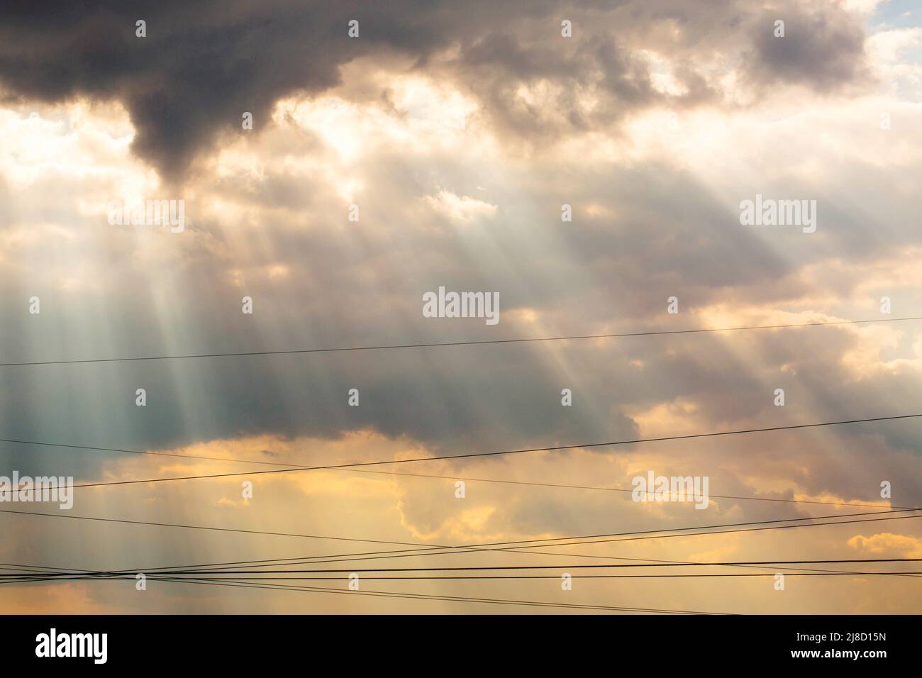 Electrical wires on a background of stormy sky with sunlight Stock ...