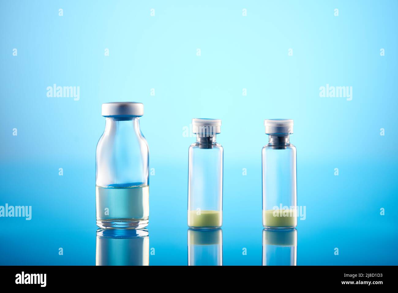Vials with Medication in a row Stock Photo - Alamy