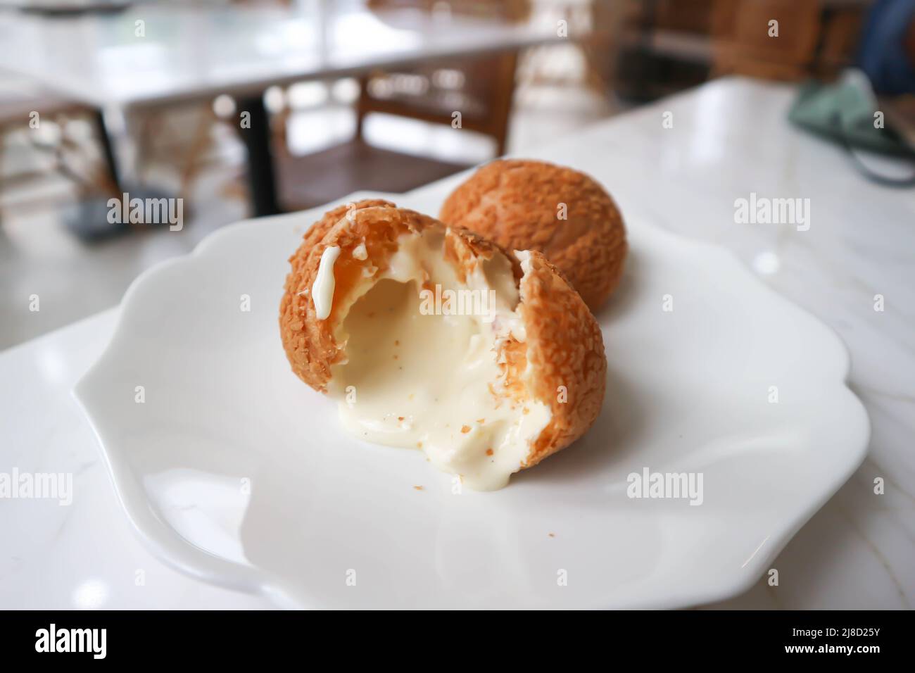 choux cream or cream puff, eclair for serve Stock Photo - Alamy