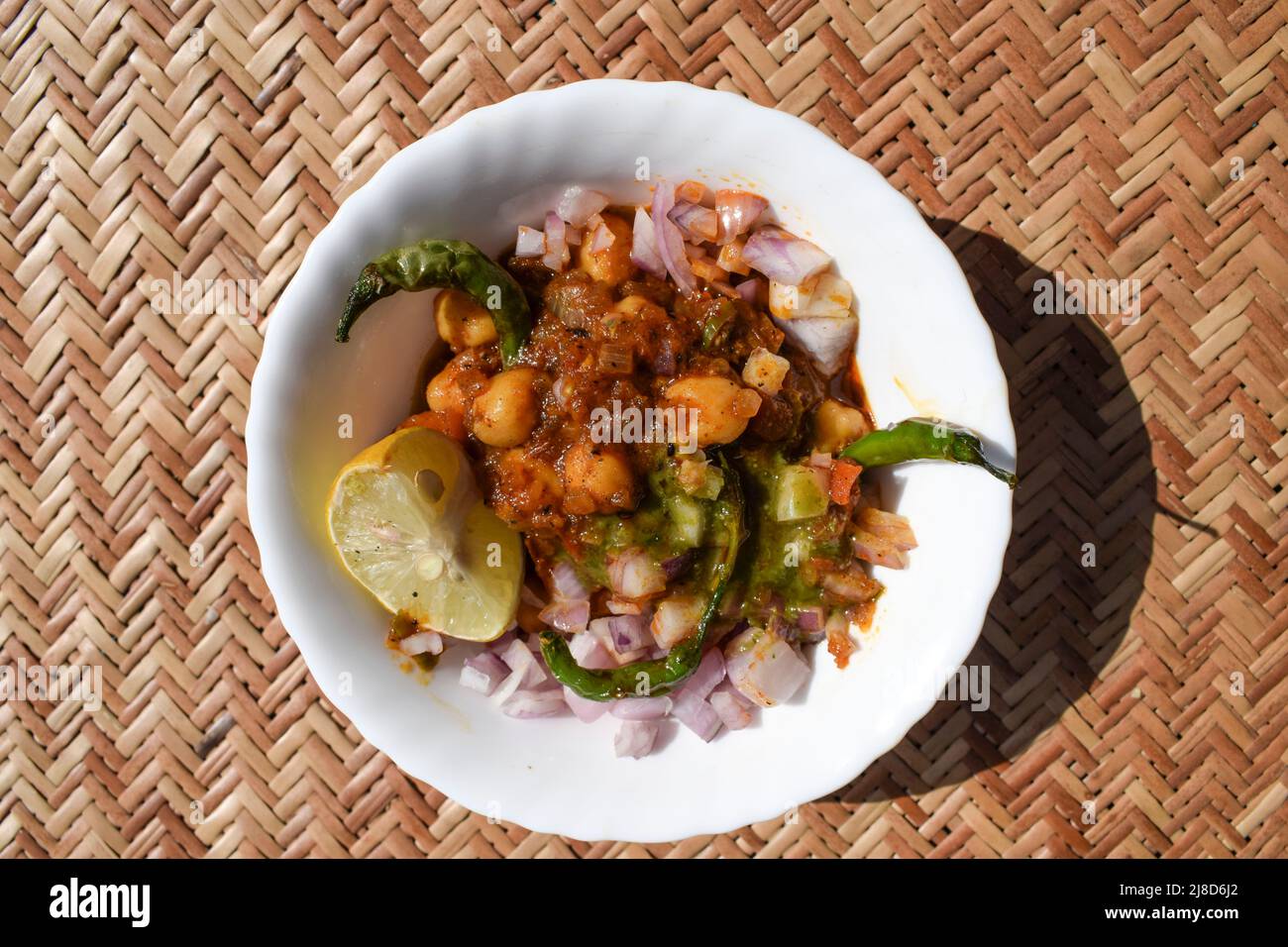 Tasty North Indian punjabi Delhi style Chhole Kulche dish. Chole made ...