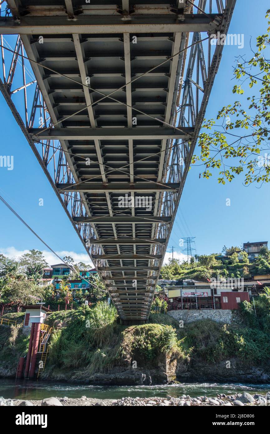 Underside of a metal bridge over a river in the Orosi Valley, Costa ...