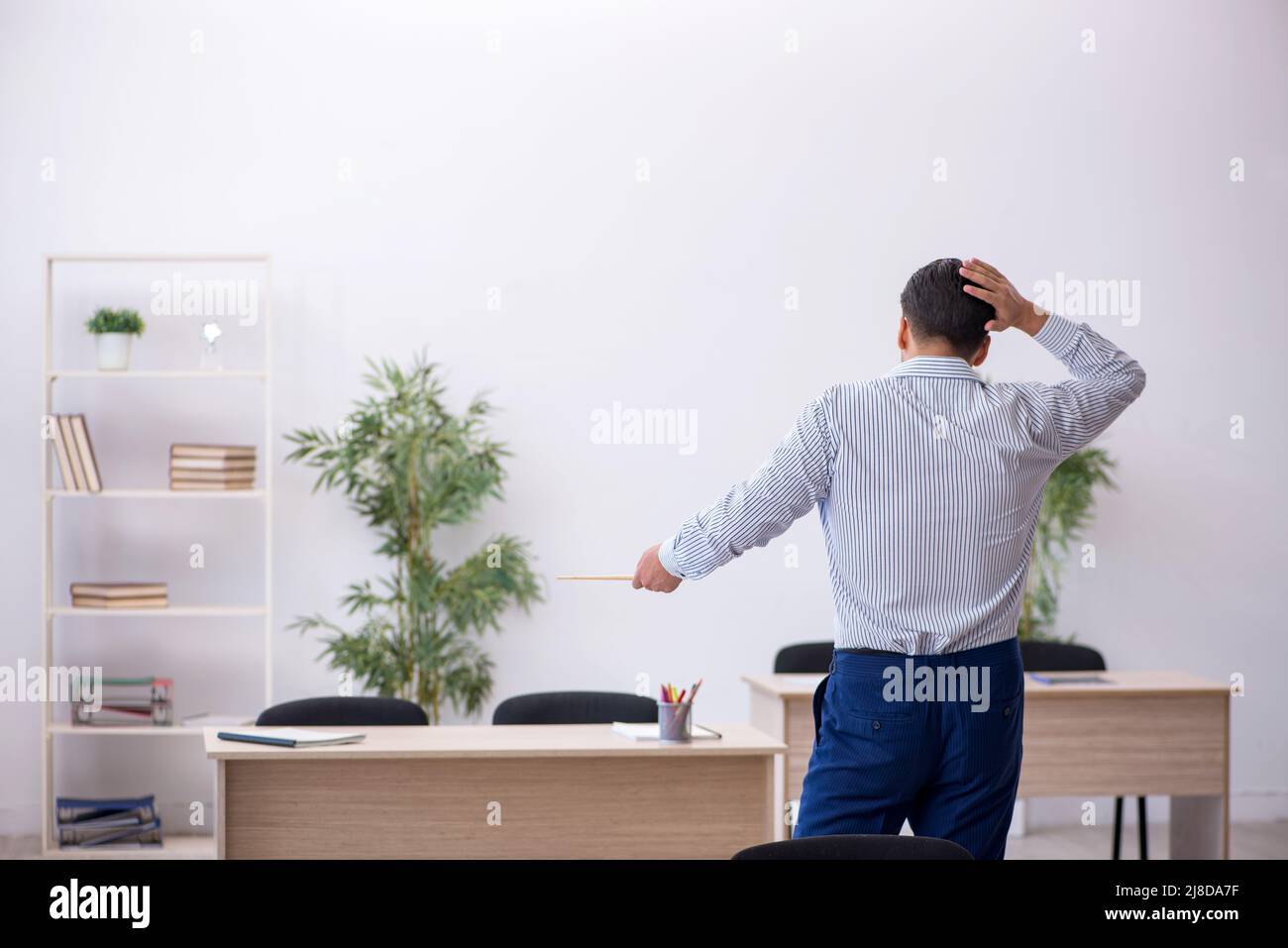 Scared teacher classroom hi-res stock photography and images - Alamy