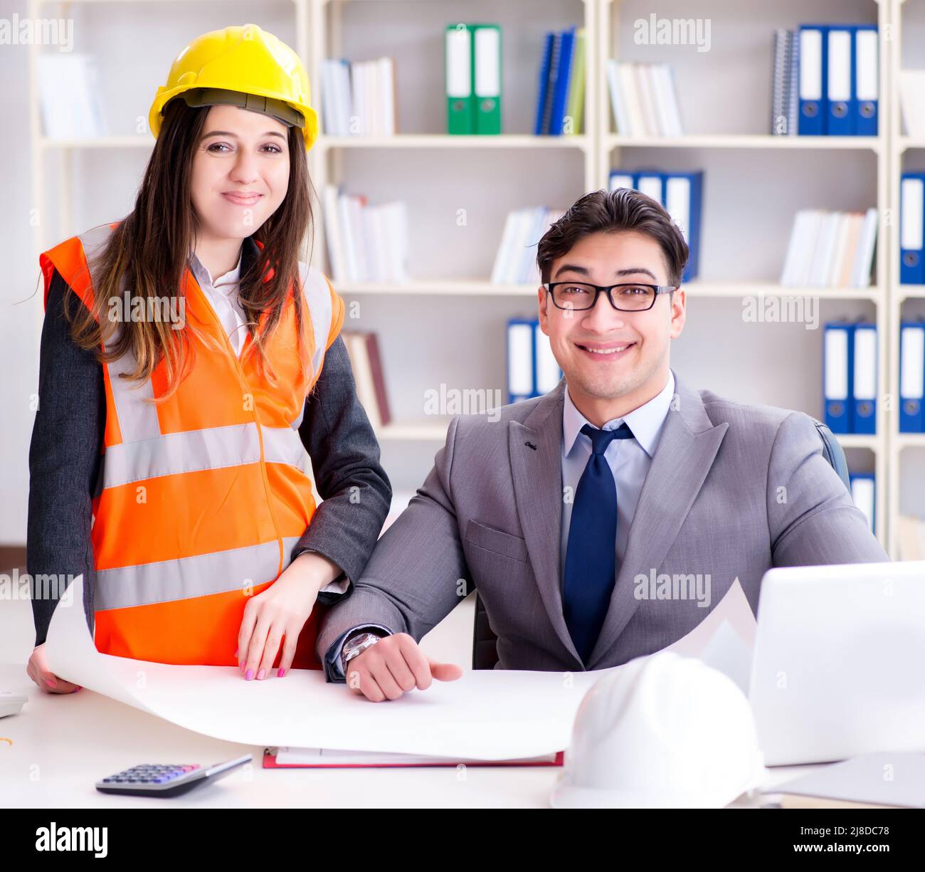 Reviewing architectural drawings hi-res stock photography and images ...