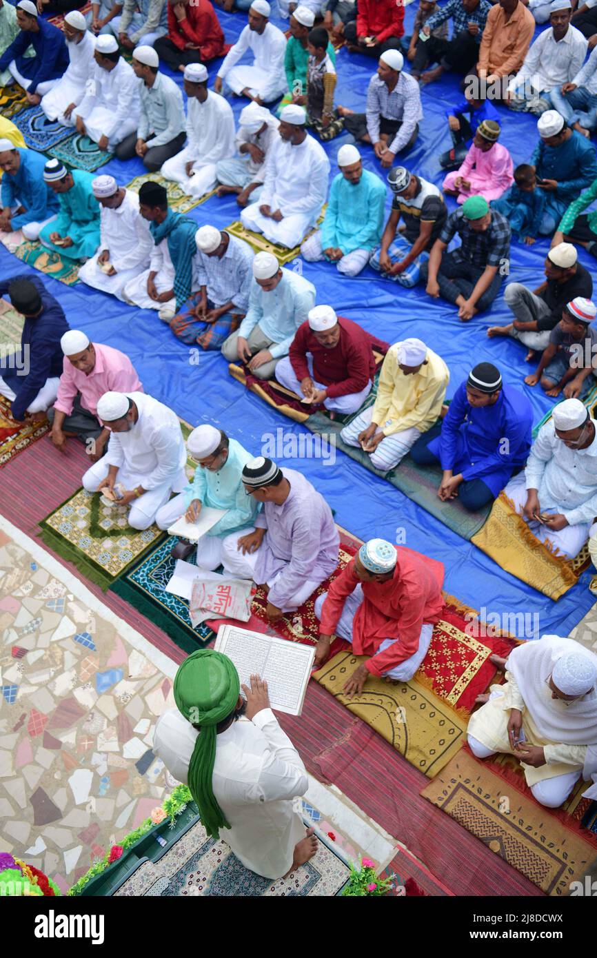Muslim devotees offer a special prayer on Eid-Al-Fitr festival, which ...
