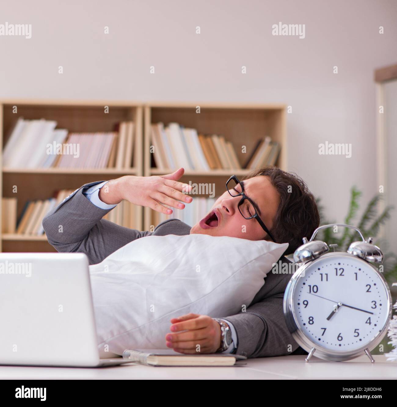 The tired man sleeping at home having too much work Stock Photo - Alamy