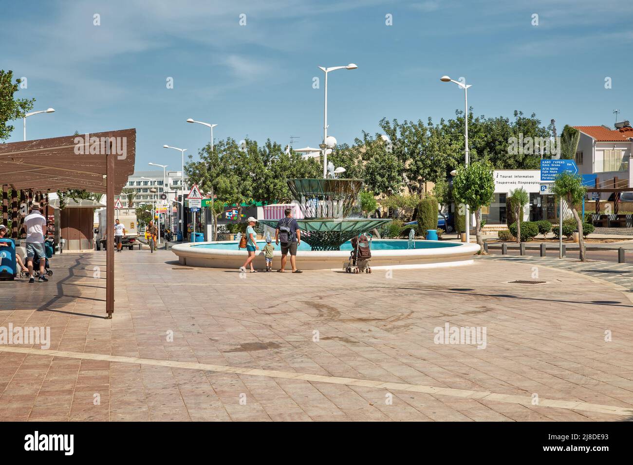 Protaras, Cyprus - May 25, 2021: People visit fountain on Protara ...