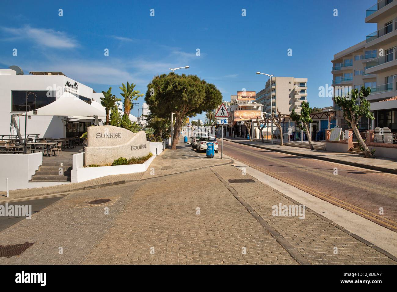 Protaras, Cyprus - May 25, 2021: Stores and hotels on Protara street ...