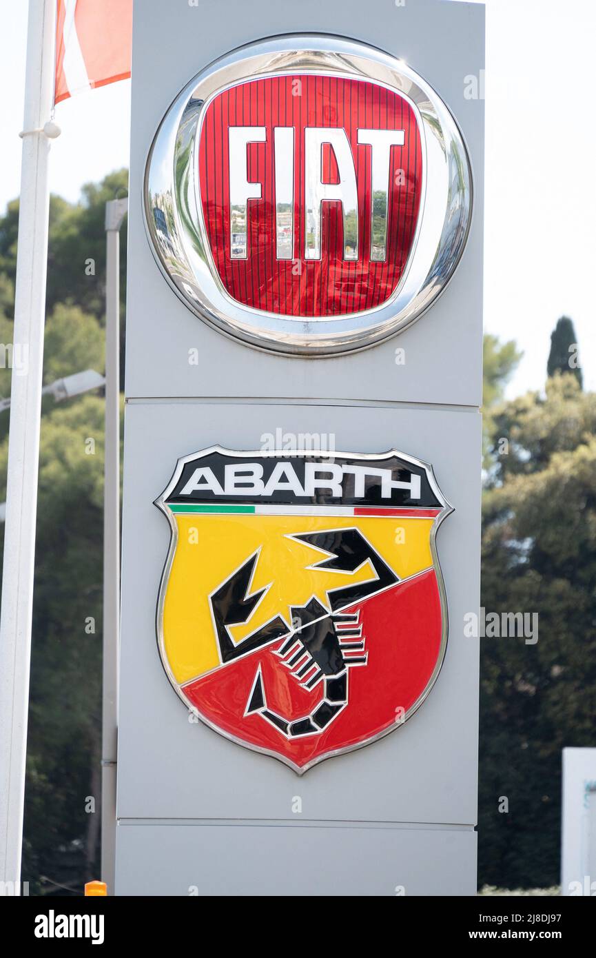 A shop sign of FIAT, ABARTH, on May 15, 2022 in Cannes, France. Photo ...