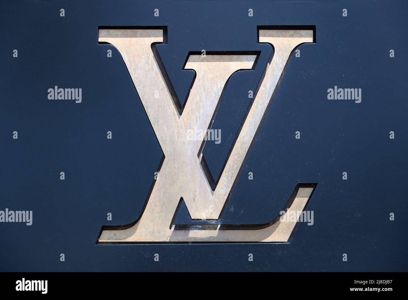 A shop sign of LOUIS VUITTON, on May 15, 2022 in Cannes, France. Photo ...