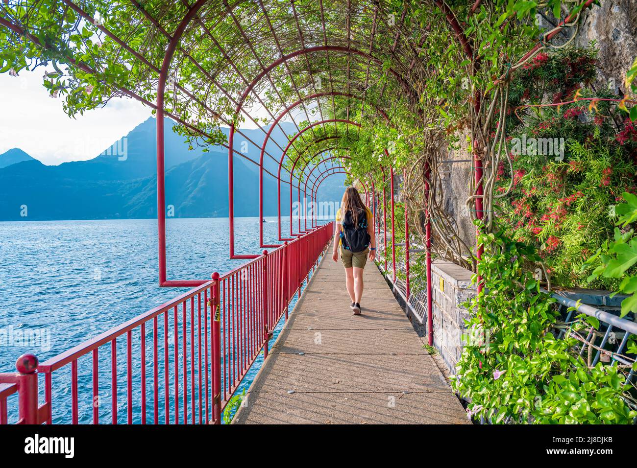 Beautiful blonde girl in Varenna, the Lombard village of lovers on Lake ...