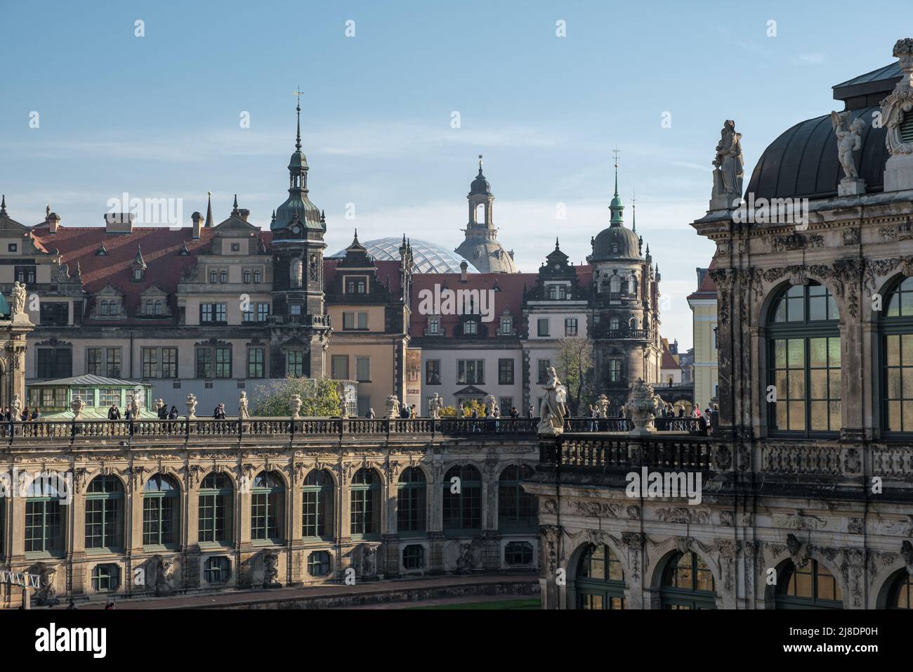 View from the Zwinger to the castle and the church Frauenkirche by day ...