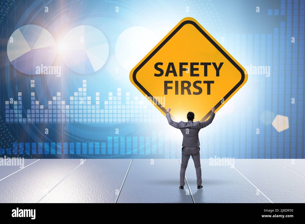 Safety first concept with the businessman Stock Photo - Alamy