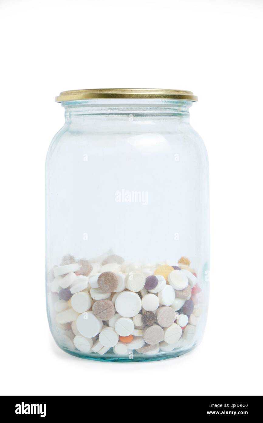 Glass jar with pills, on a white background. Stock medicines Stock ...