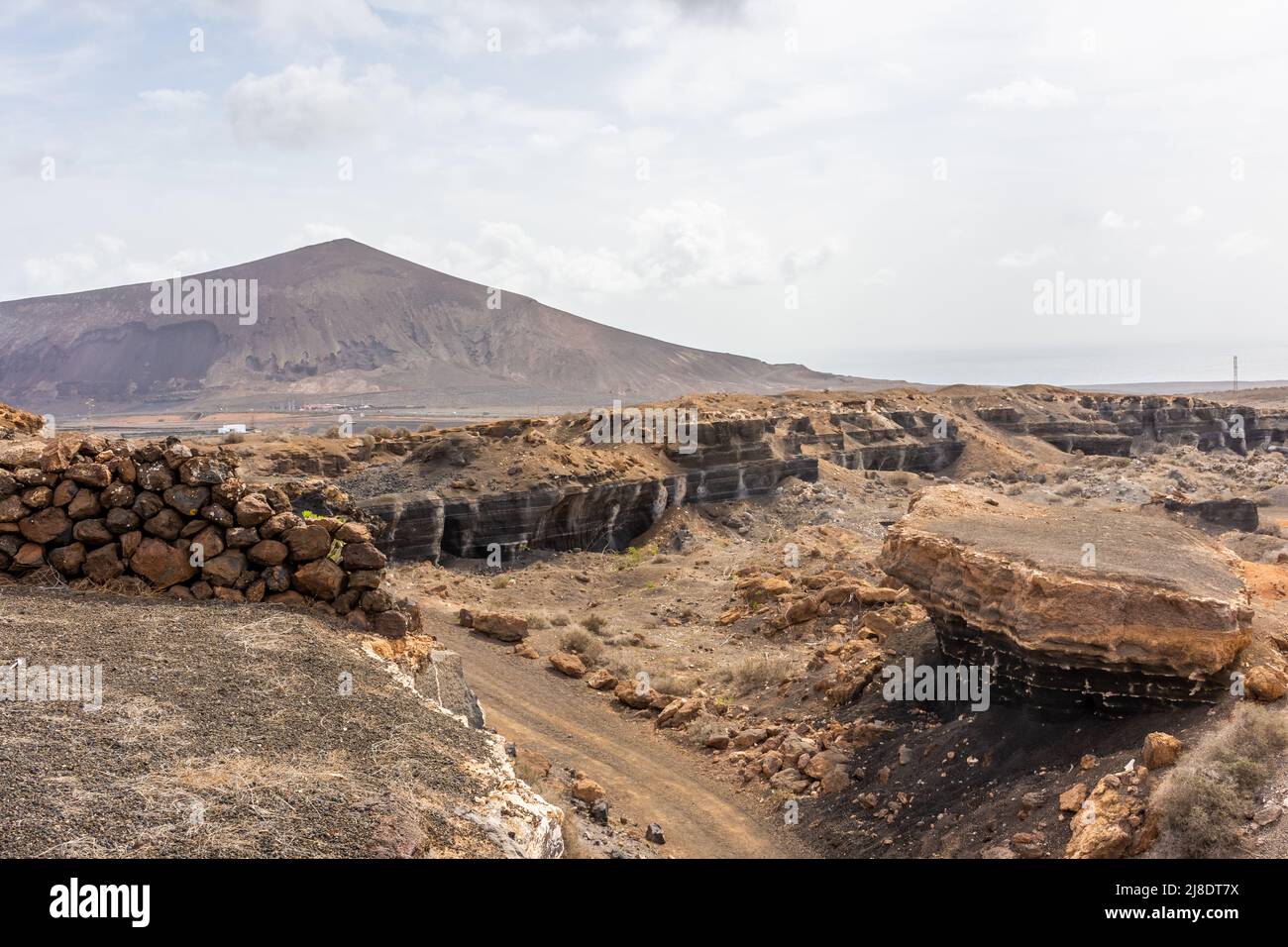 The stratified city of Lanzarote, a volcanic area with geological rock ...