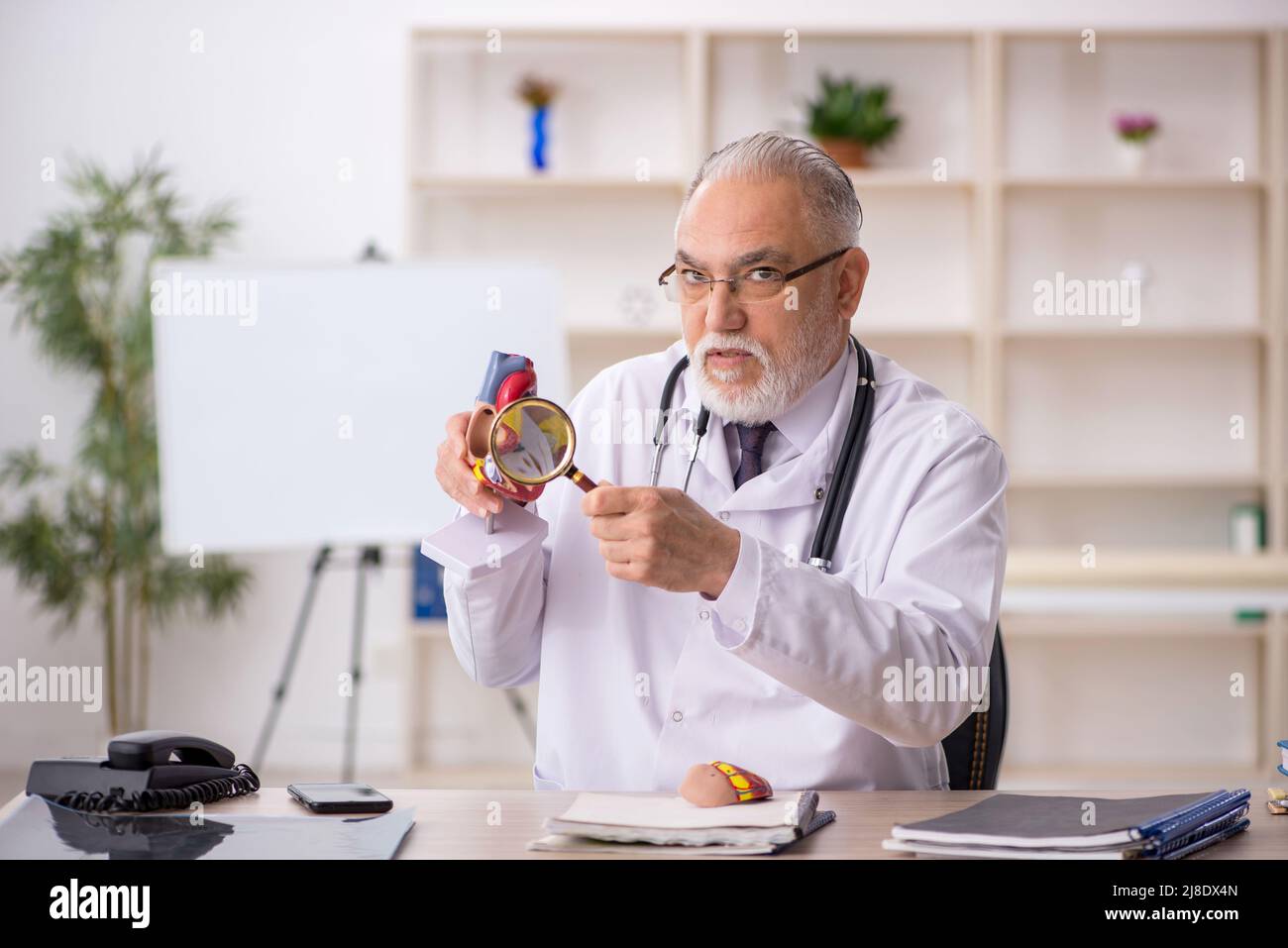 Doctor showing cardiogram old hi-res stock photography and images - Alamy