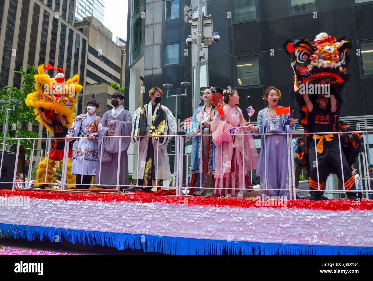 Participants march down Sixth Avenue during the first ever Asian ...