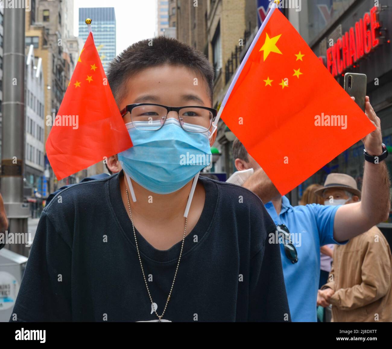 Spectators gathered on Sixth Avenue, New York City to celebrate the ...