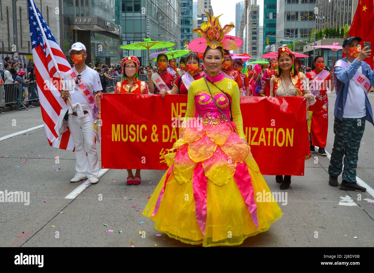 Participants march down Sixth Avenue during the first ever Asian ...