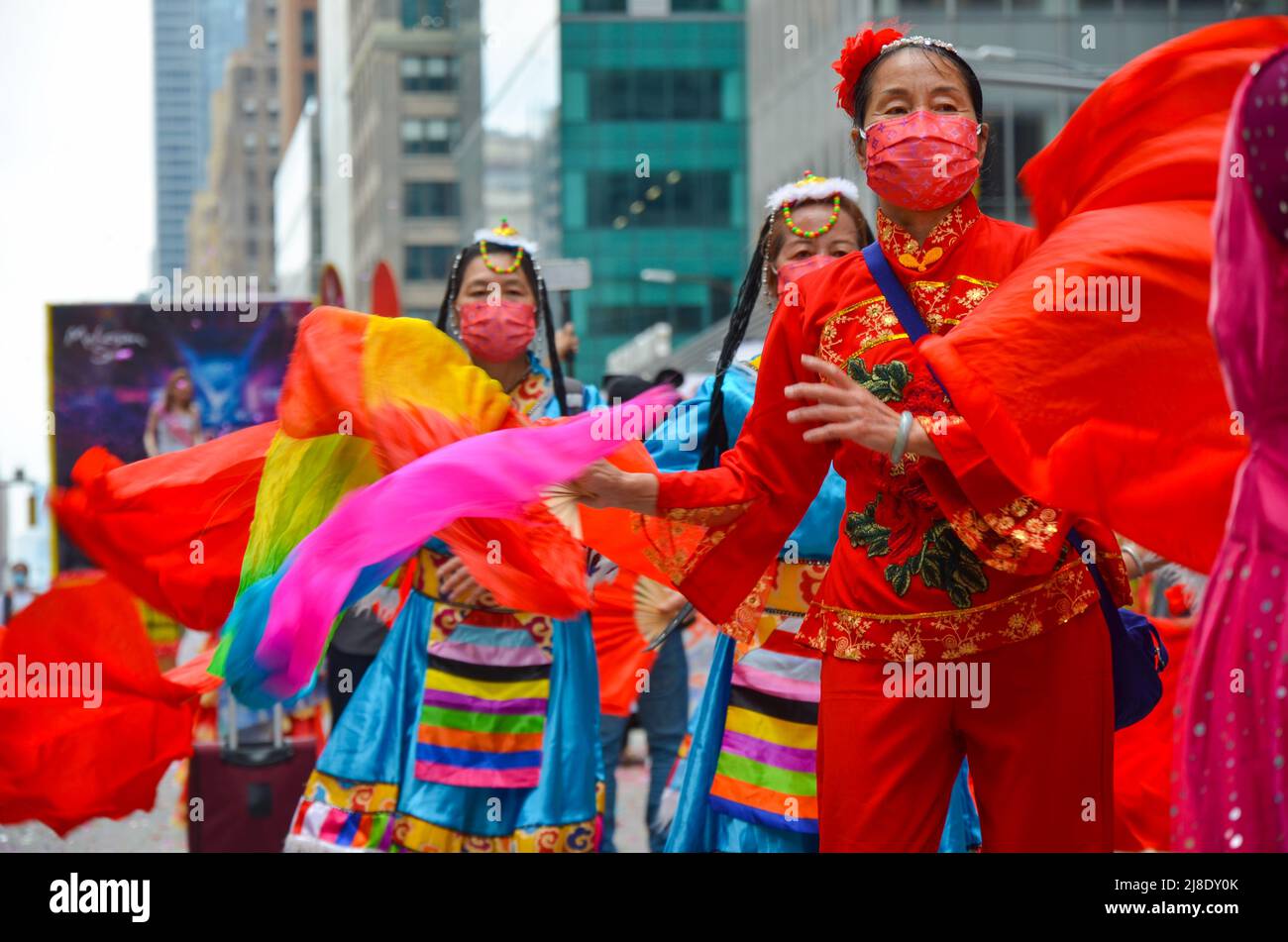 Participants march down Sixth Avenue during the first ever Asian ...