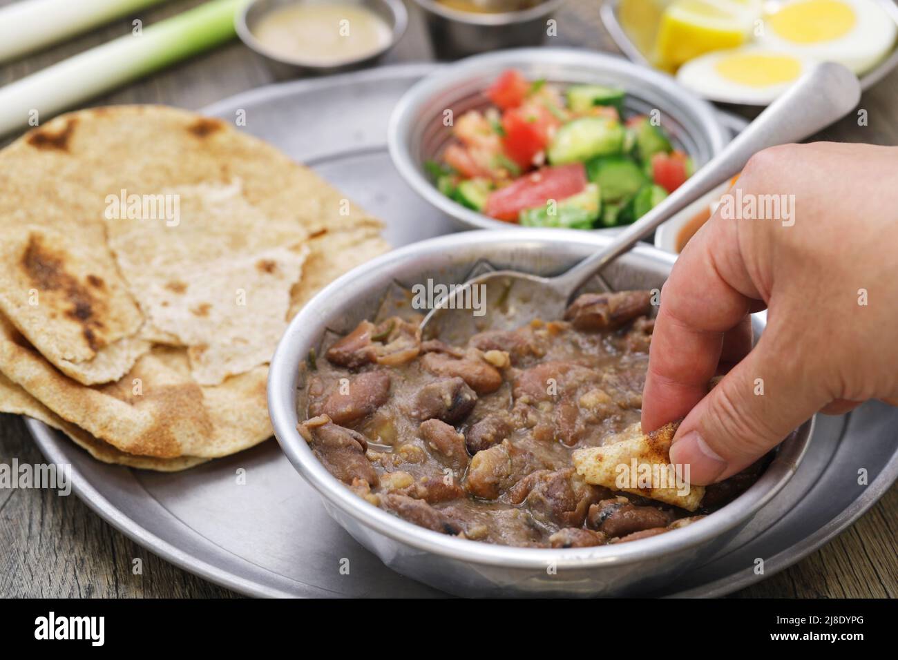 ful medames and aish baladi, Egyptian breakfast Stock Photo - Alamy