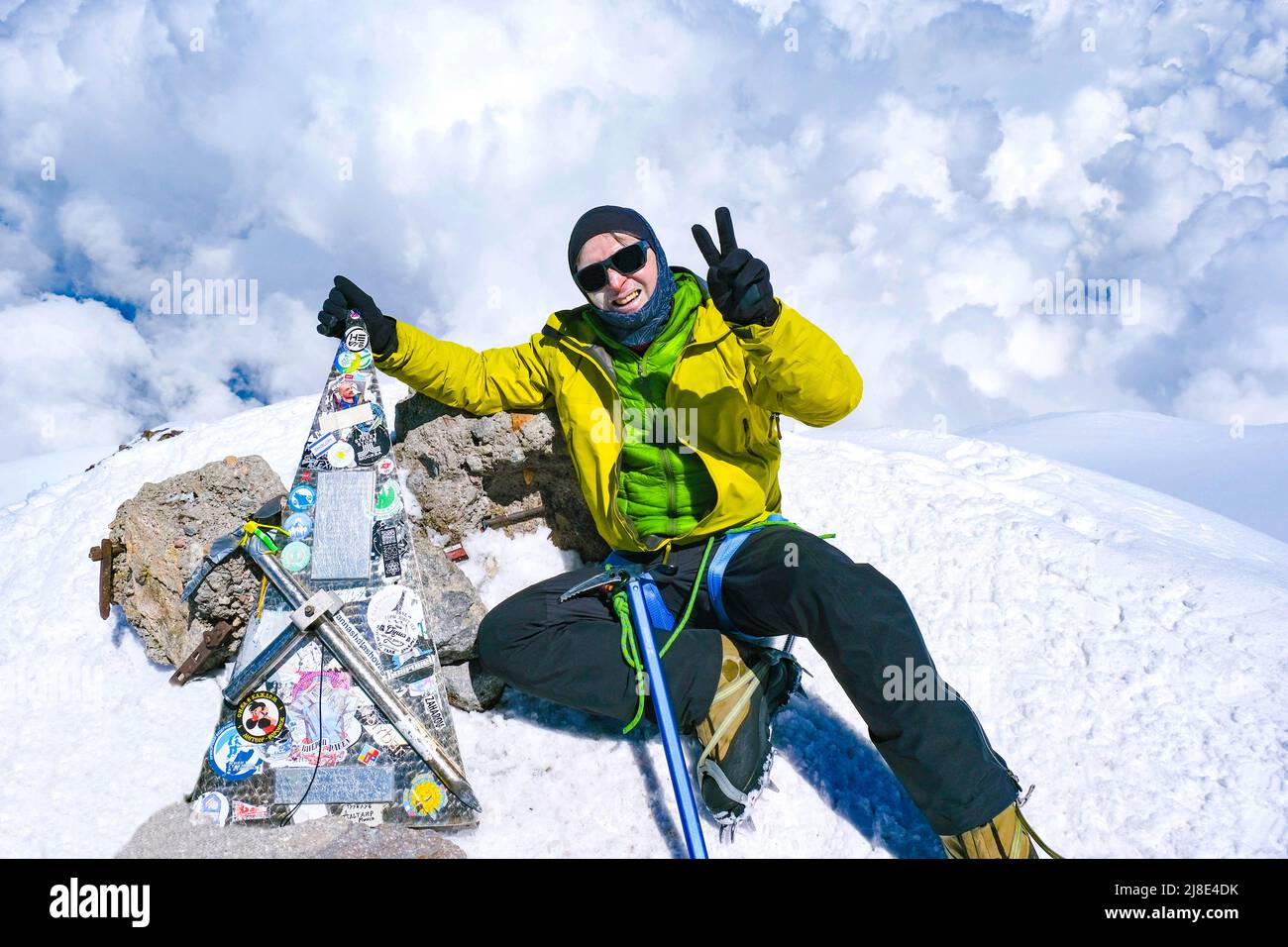 Male tourist in yellow jacket hi-res stock photography and images - Alamy
