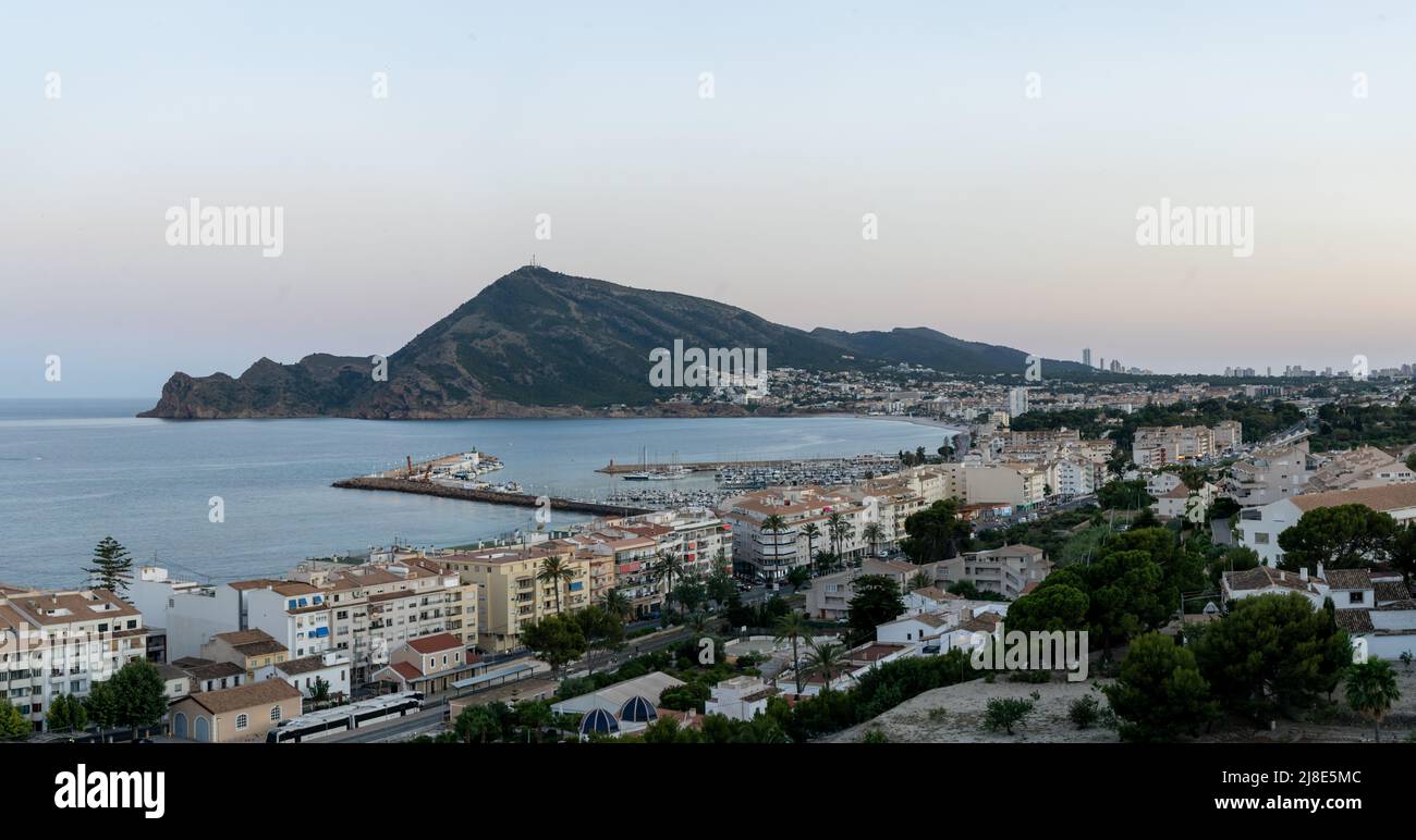 View of Altea and its port with the "Sierra Helada" and Benidorm in the ...