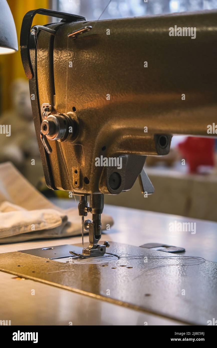 industrial old sewing machine, in tailor shop Stock Photo - Alamy