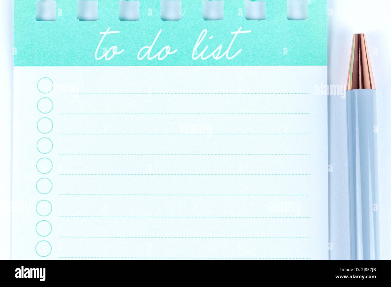 To do list empty closeup with a pen. Paper notebook sheet with a bucket ...