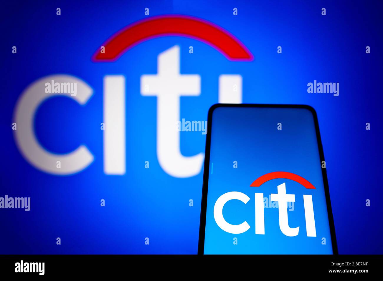 In this photo illustration the Citibank logo seen displayed on a ...