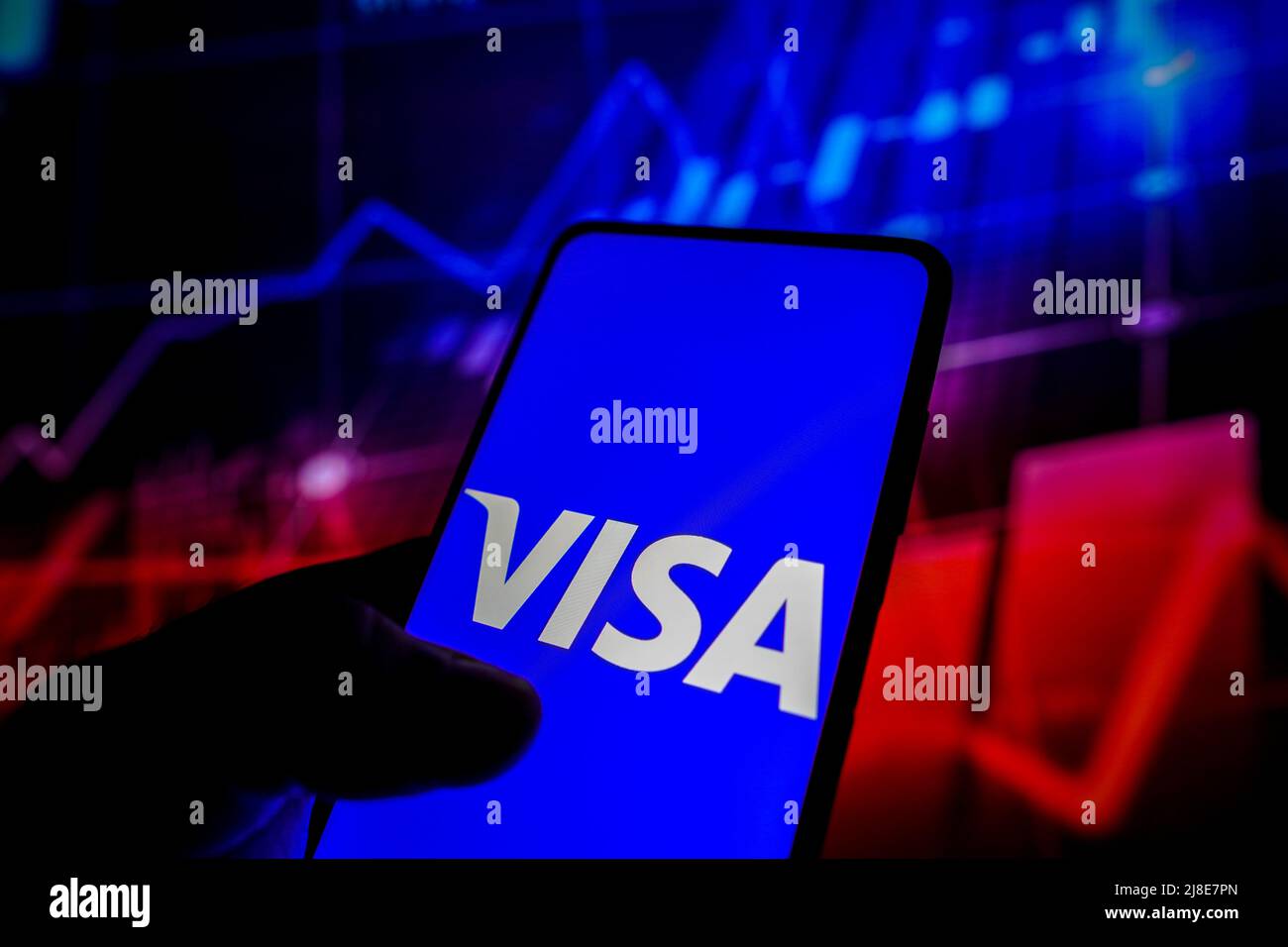 In this photo illustration the Visa Inc. logo seen displayed on a smartphone Stock Photo - Alamy