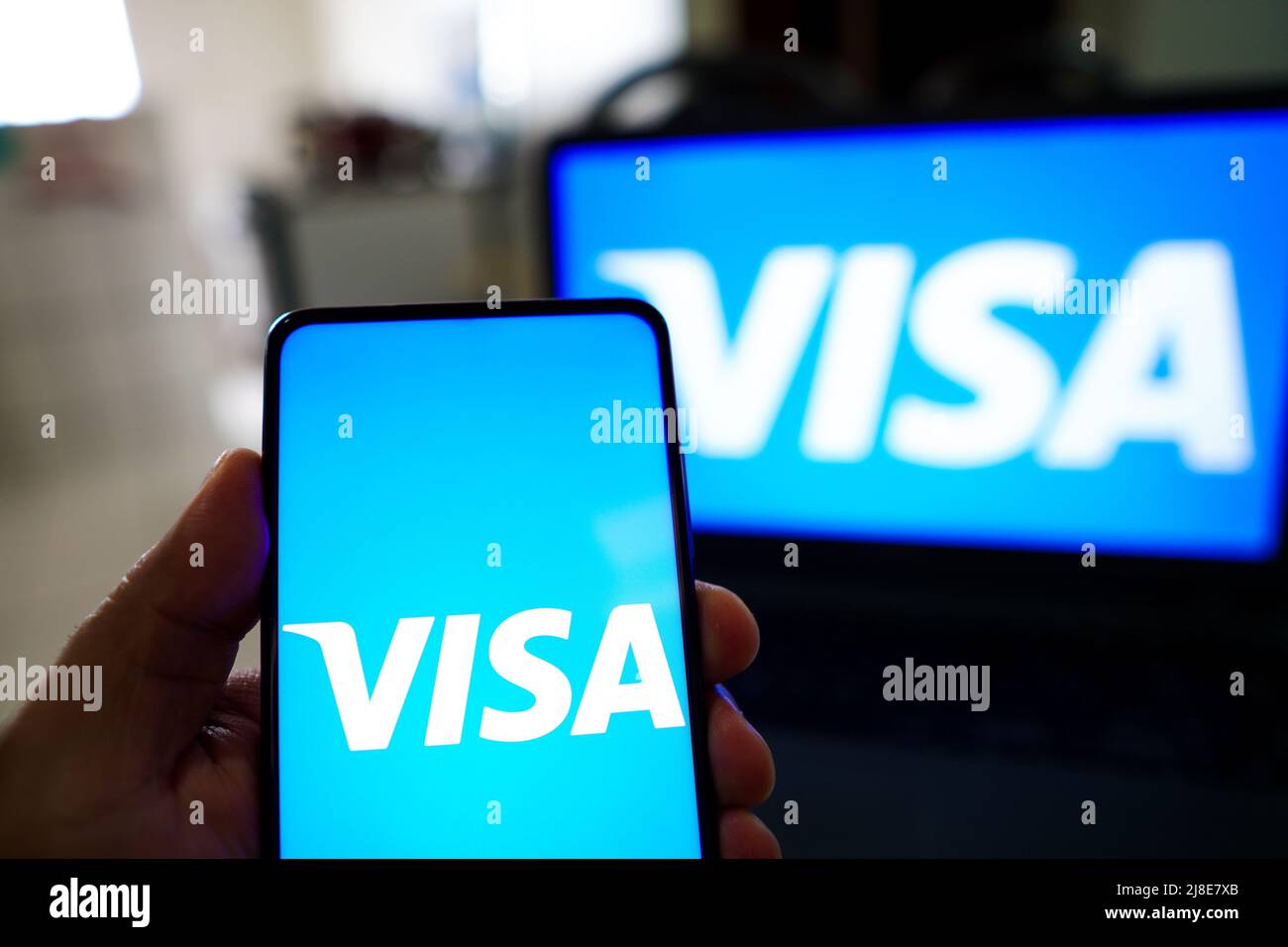 In this photo illustration the Visa Inc. logo seen displayed on a ...