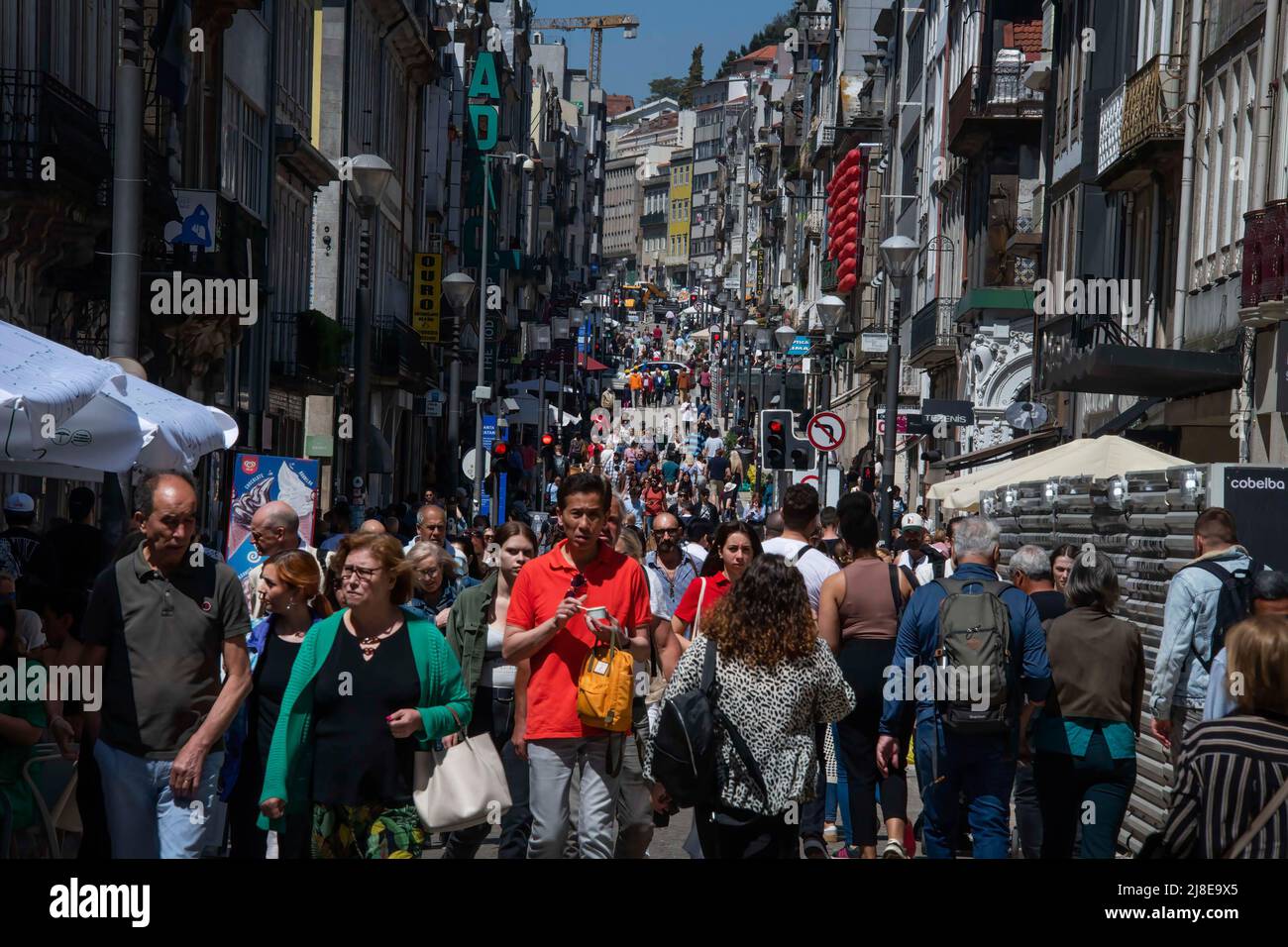 Porto, Portugal. 5th May, 2022. People are seen walking along Rua da ...