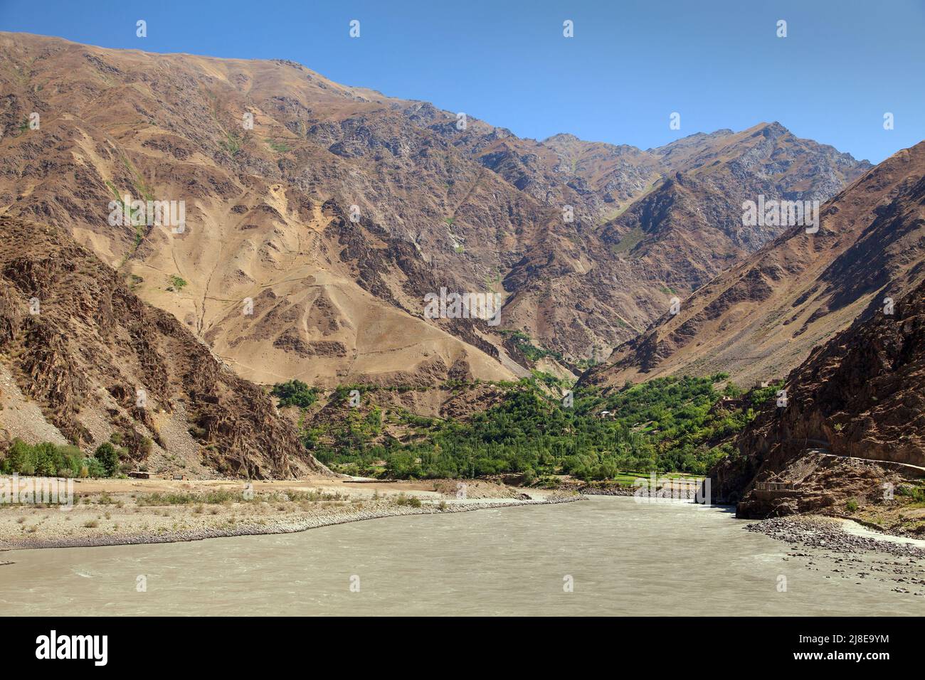 Panj river and Pamir mountains. Panj is upper part of Amu Darya river ...
