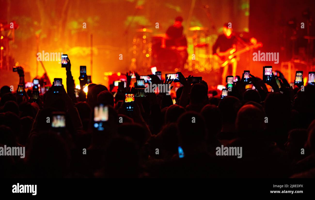 Hands phones on concert hi-res stock photography and images - Alamy